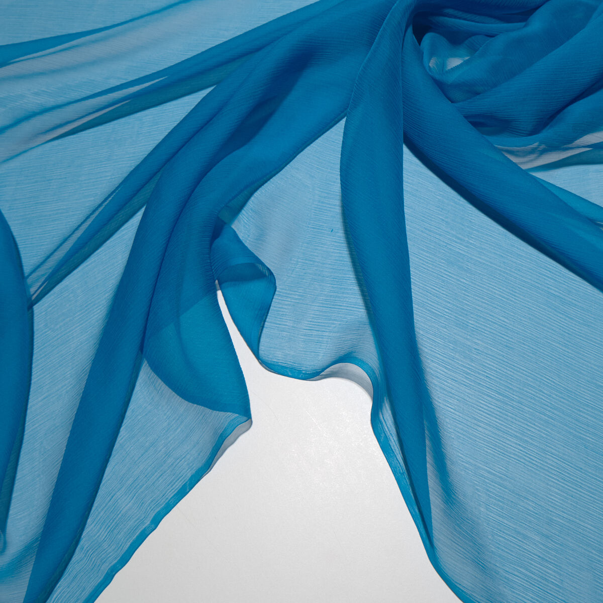 Voal de matase naturala creponat (muselina) Turcoaz închis
