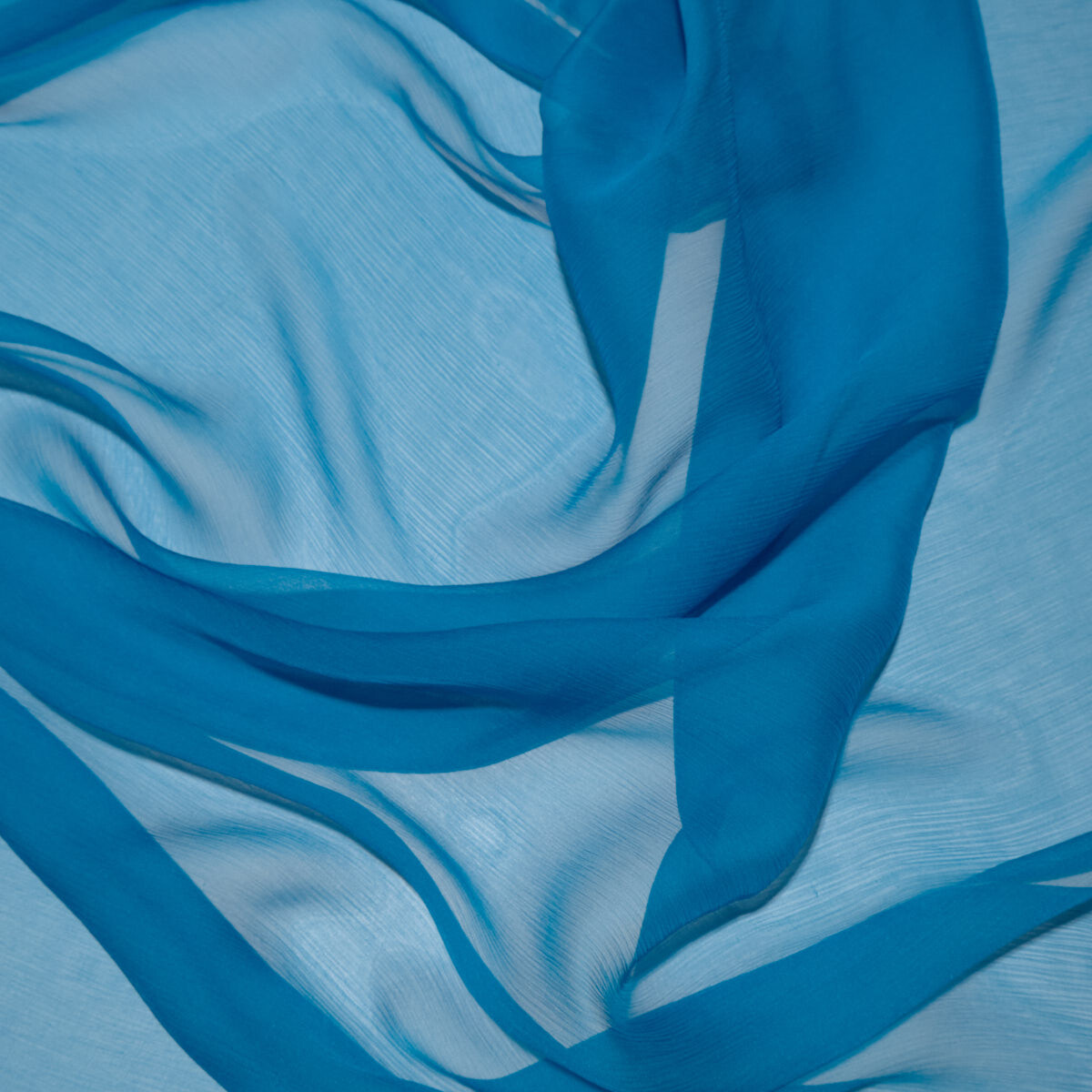 Voal de matase naturala creponat (muselina) Turcoaz închis