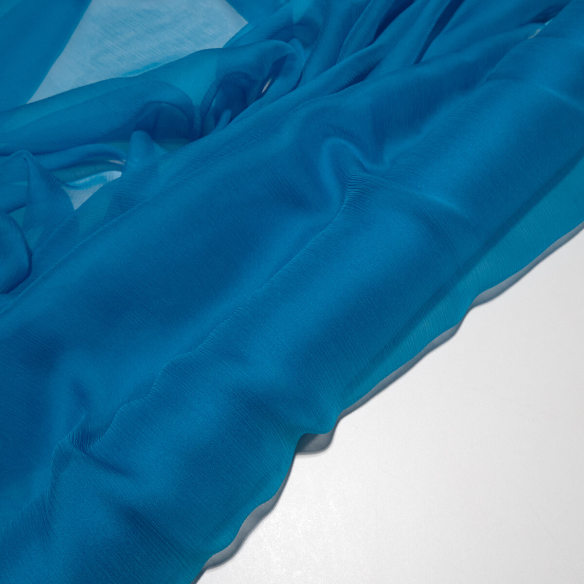 Voal de matase naturala creponat (muselina) Turcoaz închis